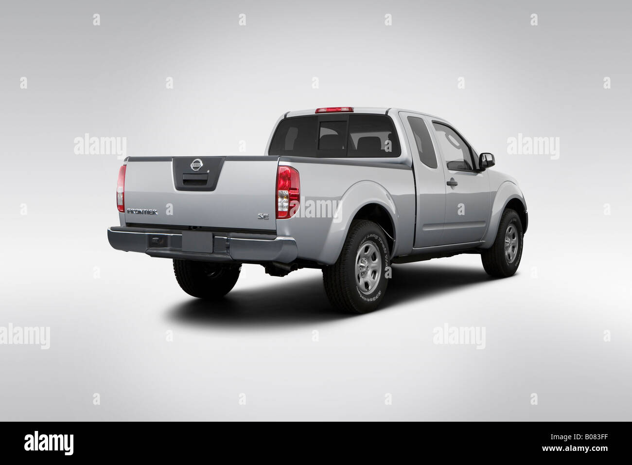 2008 Nissan Frontier SE in Silver - Rear angle view Stock Photo - Alamy