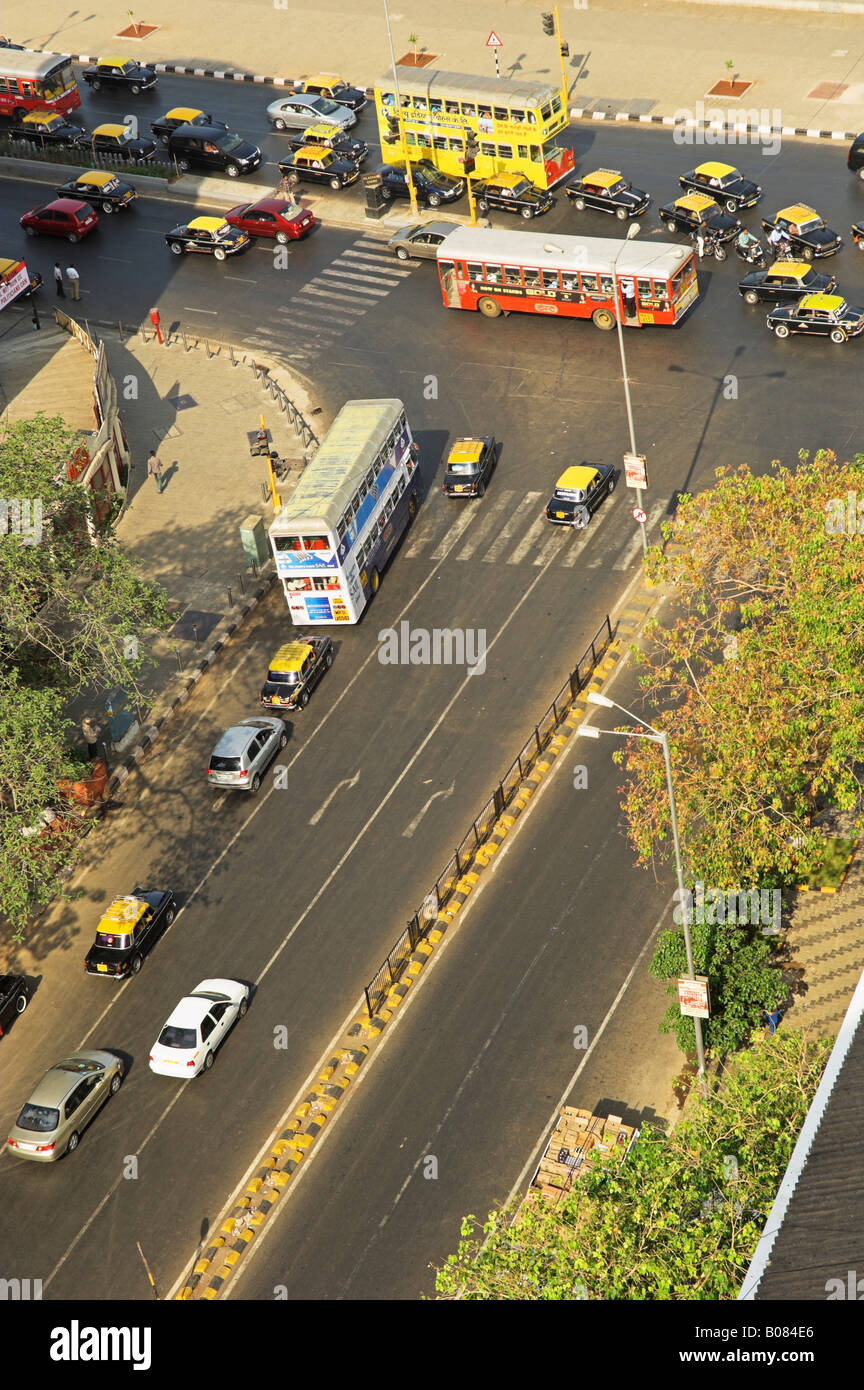 Aerial view looking down on road with cars buses traffic T junction ...