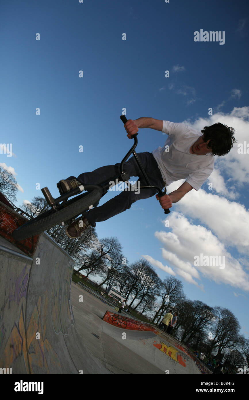 a man riding a bmx bycicle on a half pipe Stock Photo - Alamy