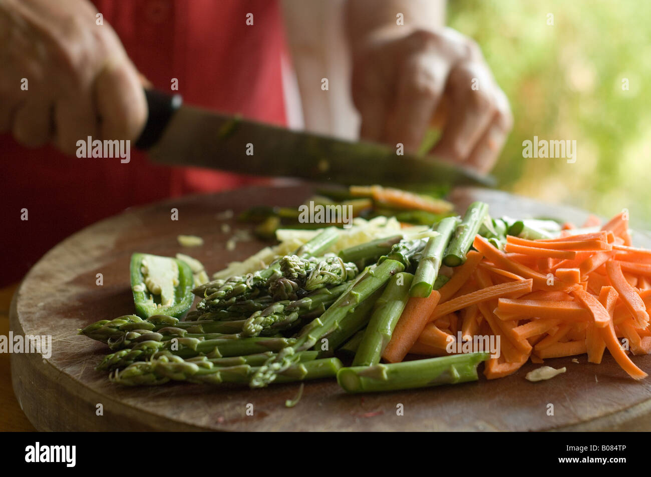 Chopping of vegetables in preparation for a meal Stock Photo - Alamy