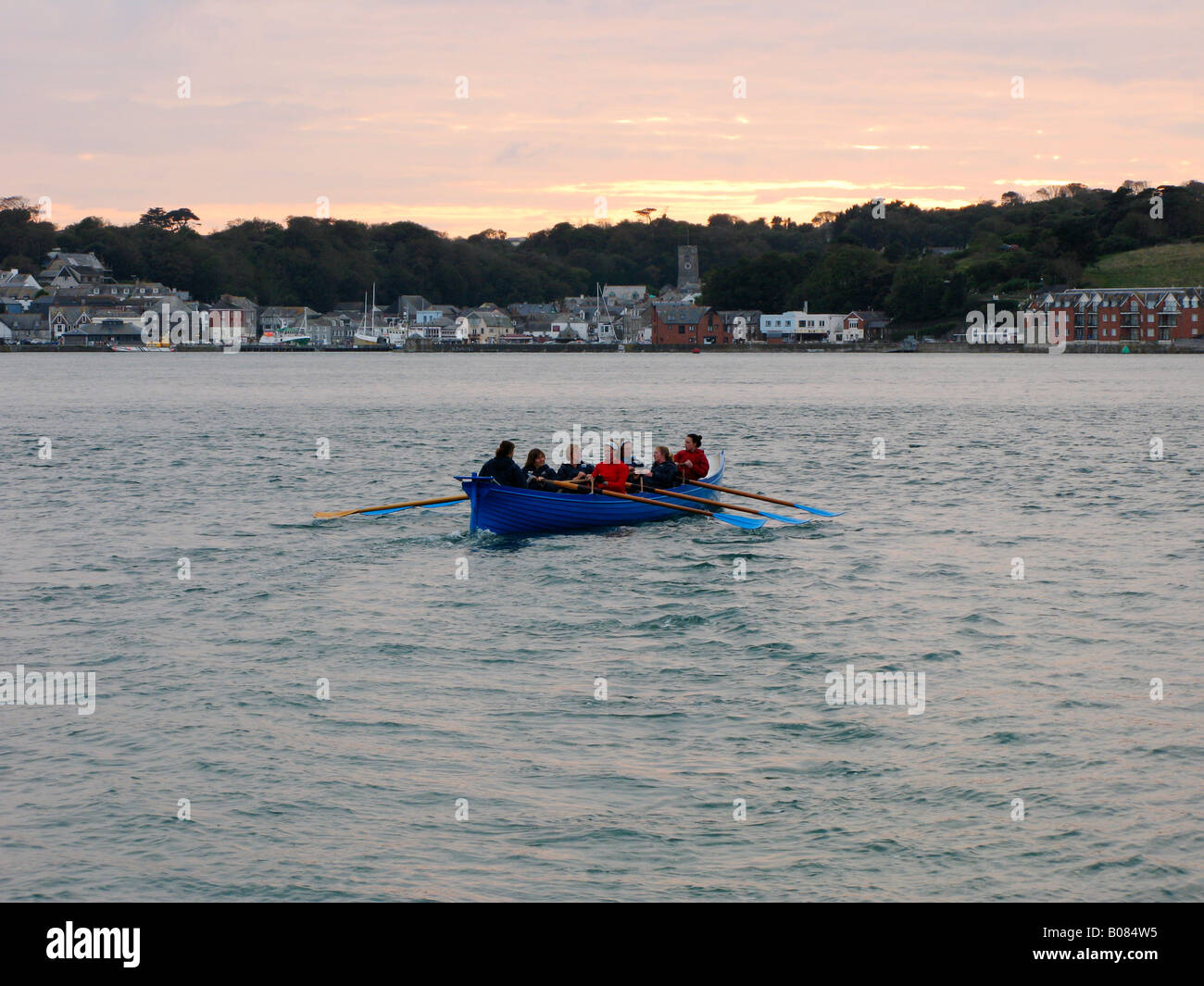 People rowing out on a gig at Rock Cornwall UK Stock Photo - Alamy
