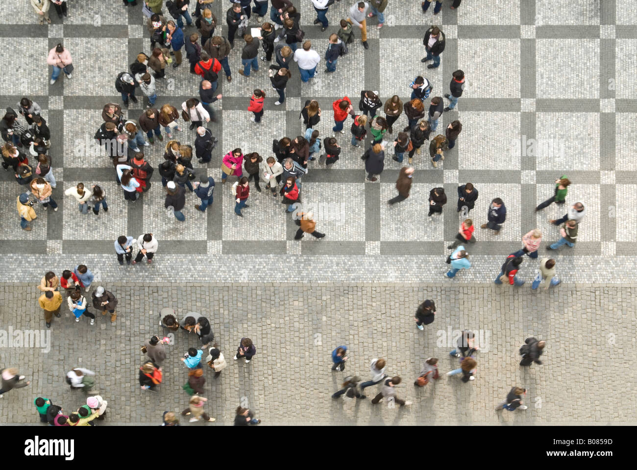Horizontal aerial view of crowds of tourists gathered underneath the ...