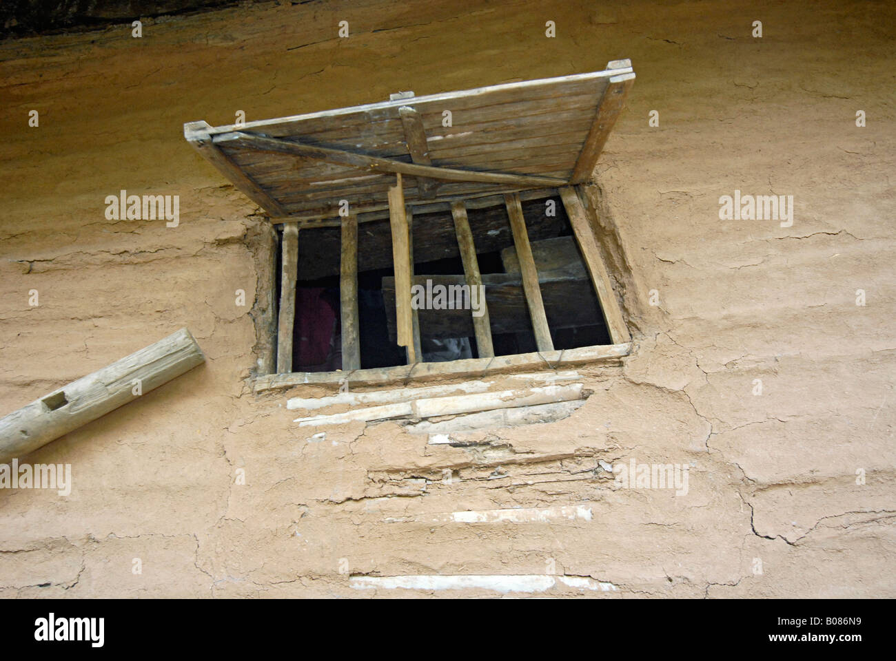Window propped open on a Warli tribal house Stock Photo - Alamy
