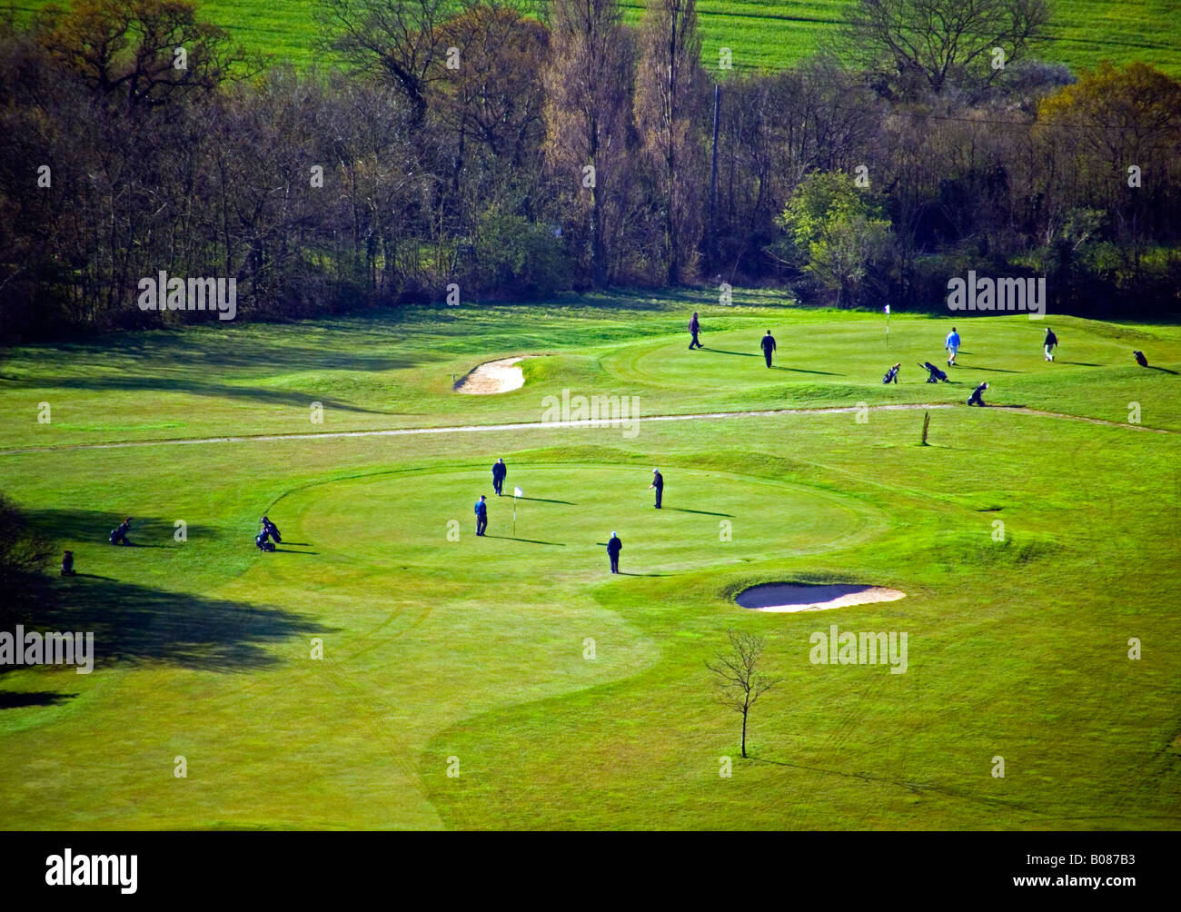 aerial view of golf players on the putting green Stock Photo - Alamy