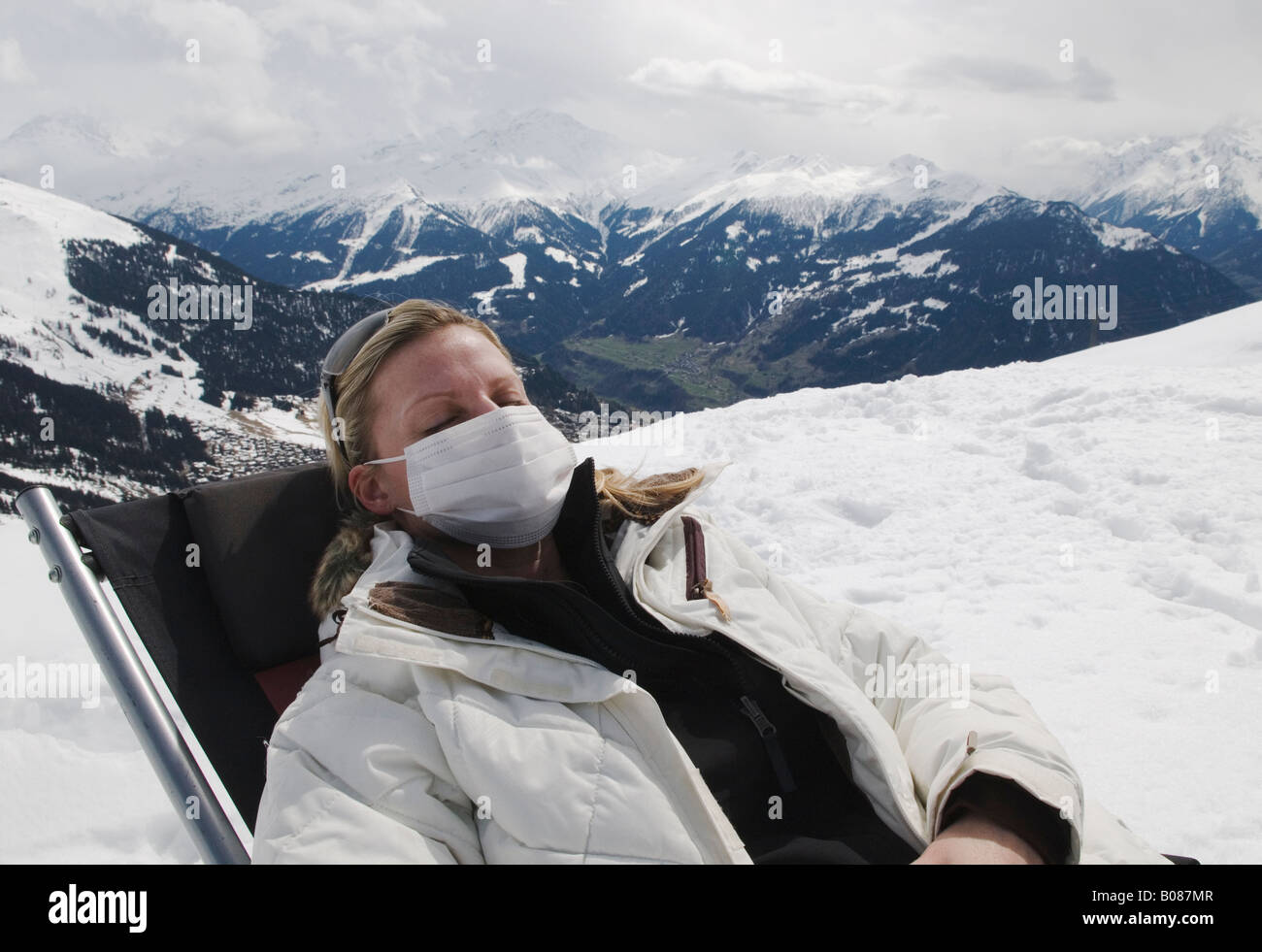 woman wearing breathing mask while on a mountain Stock Photo - Alamy