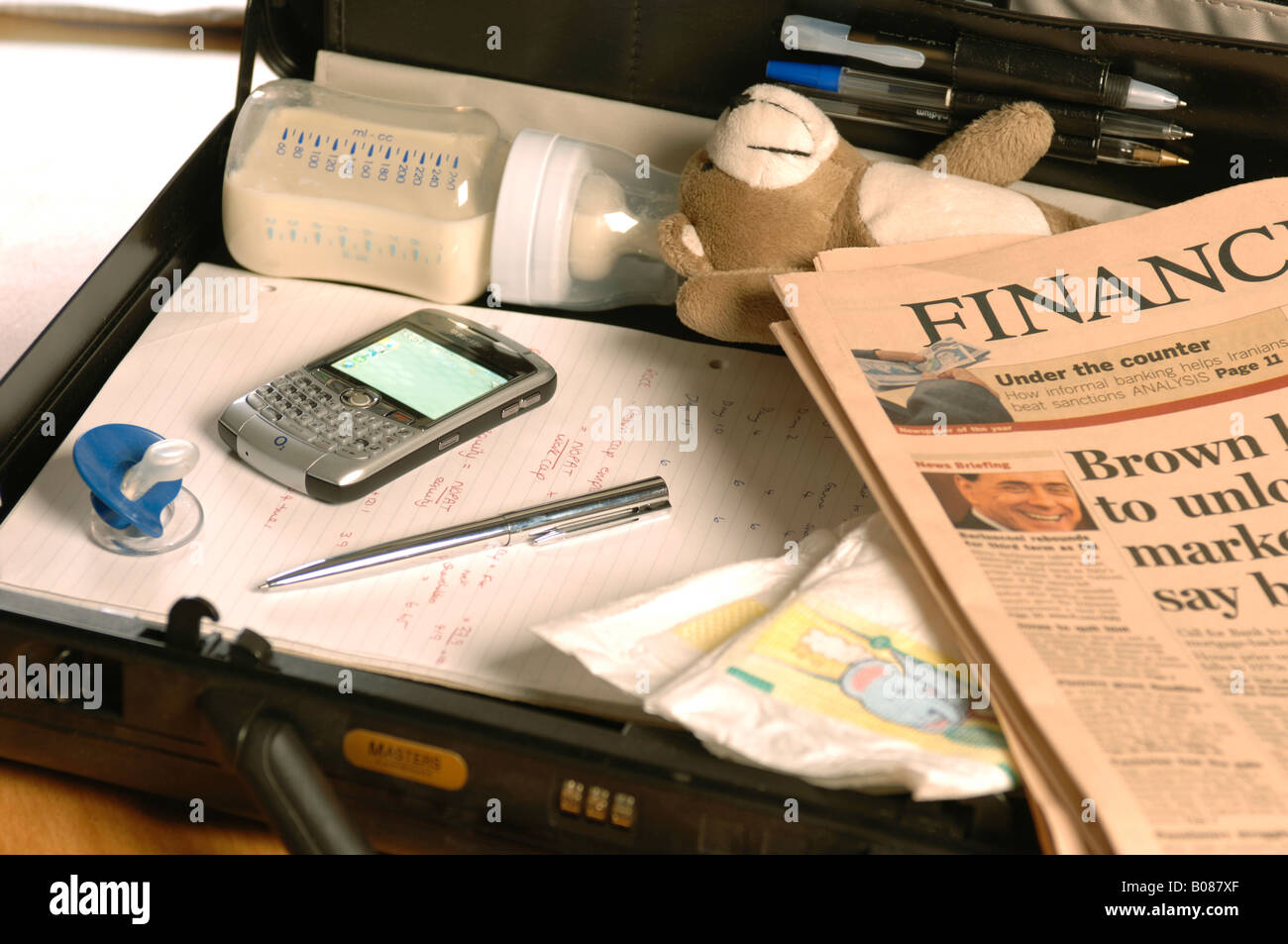 a briefcase full of work and baby items Stock Photo - Alamy