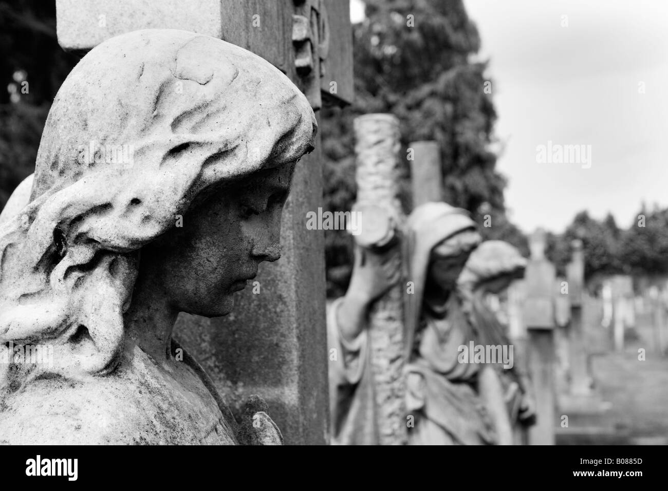 Cemetary with statues Stock Photo - Alamy