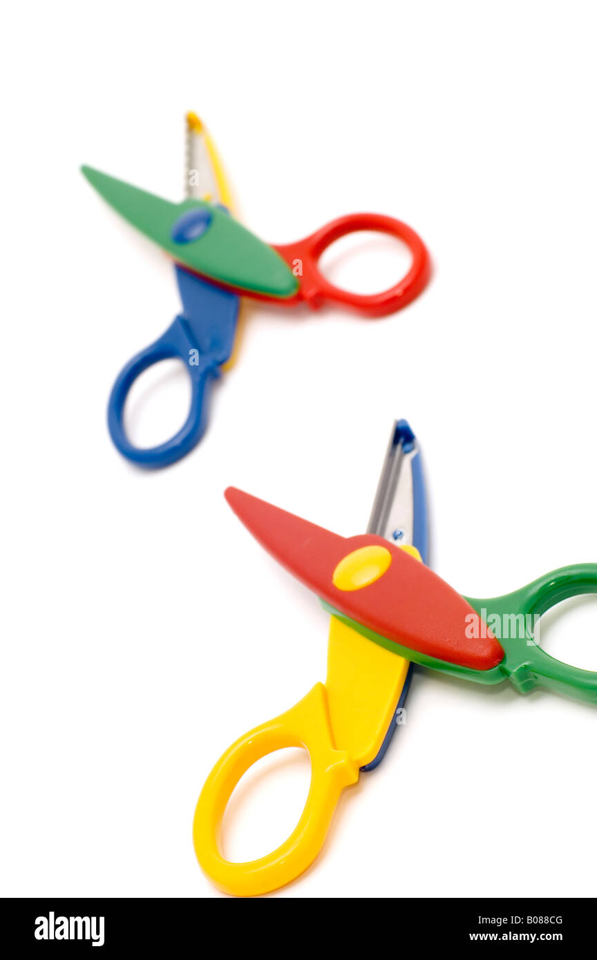 object on white wavy scissors Stock Photo - Alamy