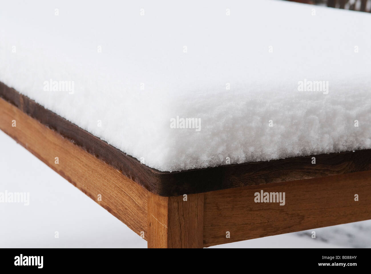 layer of snow on a table Stock Photo - Alamy
