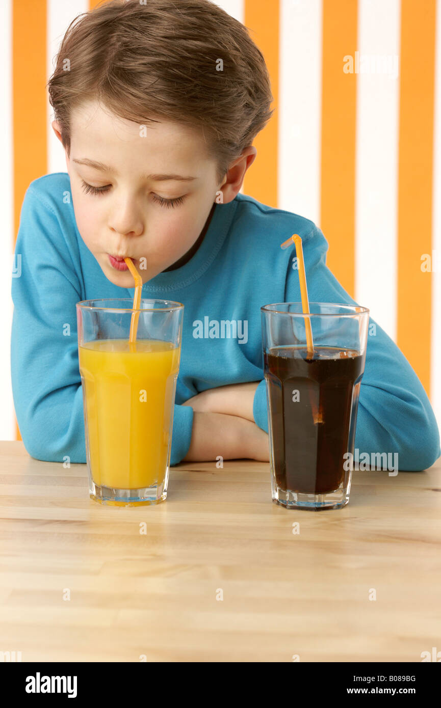 Child drinking cola hi-res stock photography and images - Alamy