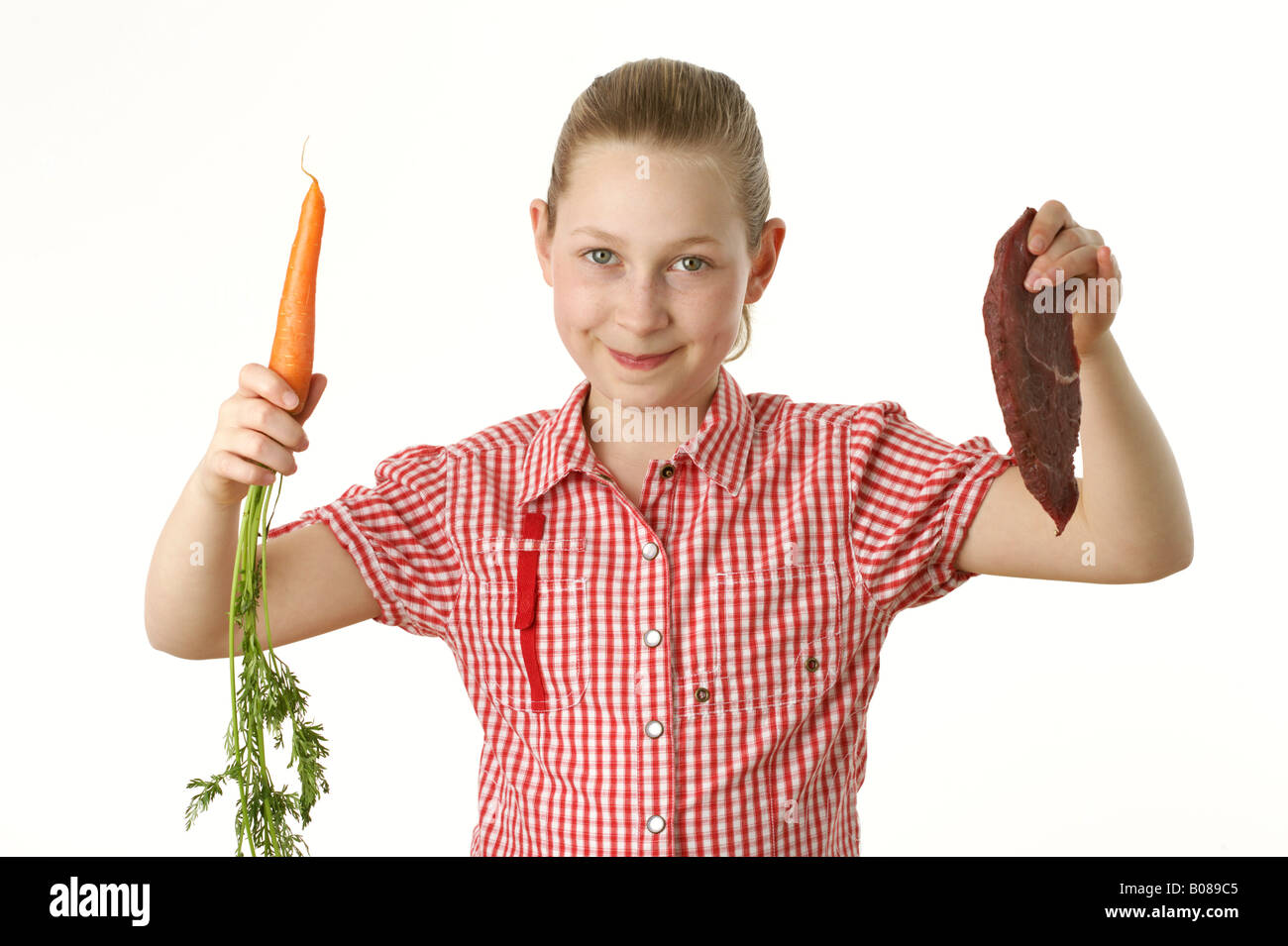 Girl showing food Stock Photo - Alamy