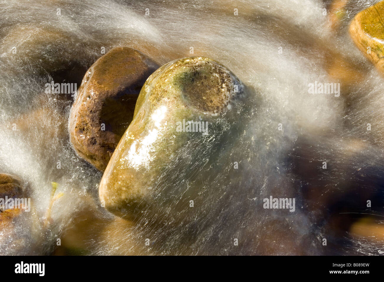 Flowing water over stones hi-res stock photography and images - Alamy
