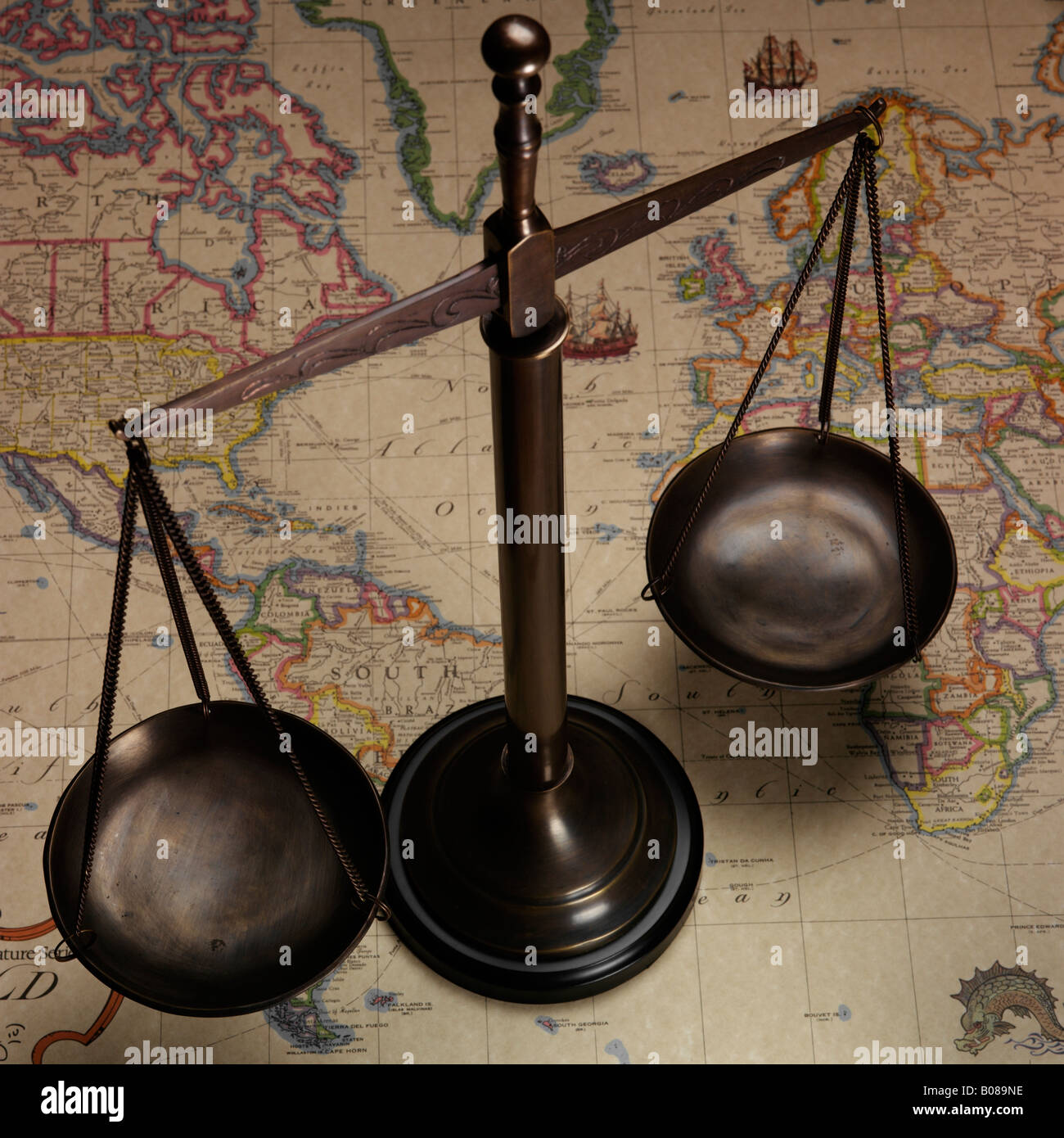 a scale shot over a world map in studio Stock Photo - Alamy