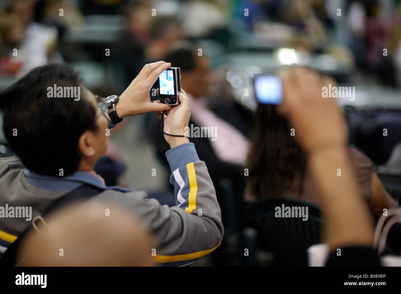 Mobile phone cameras being used to photograph an event Stock Photo - Alamy