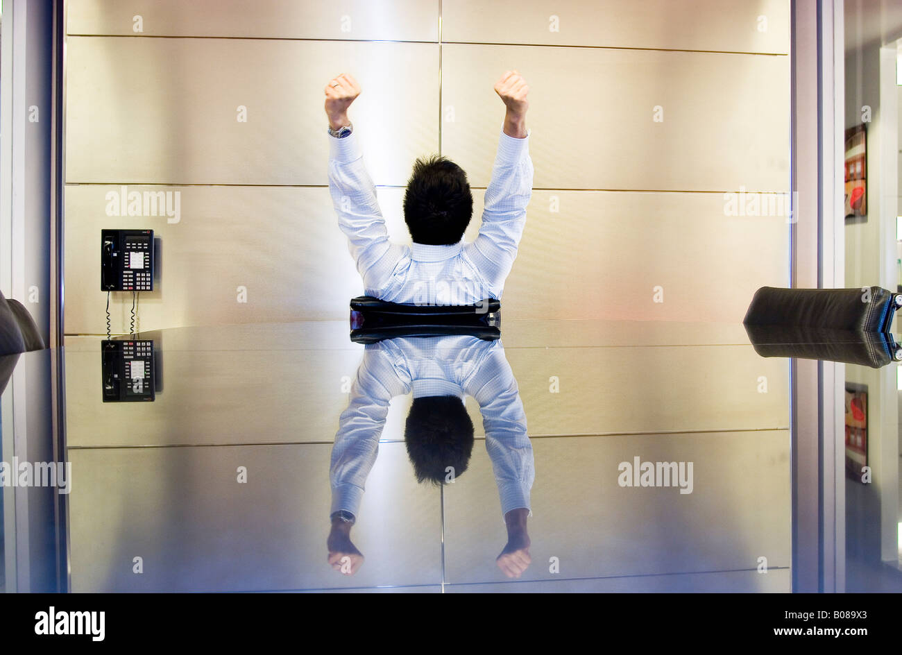 Businessman leaning over office chair hi-res stock photography and ...