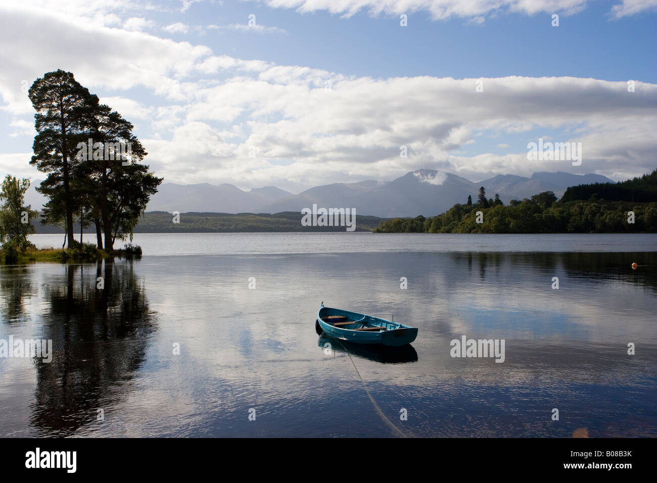 Boat on Loch Lochy with Ben Nevis behind, Inverness-shire, Scotland ...
