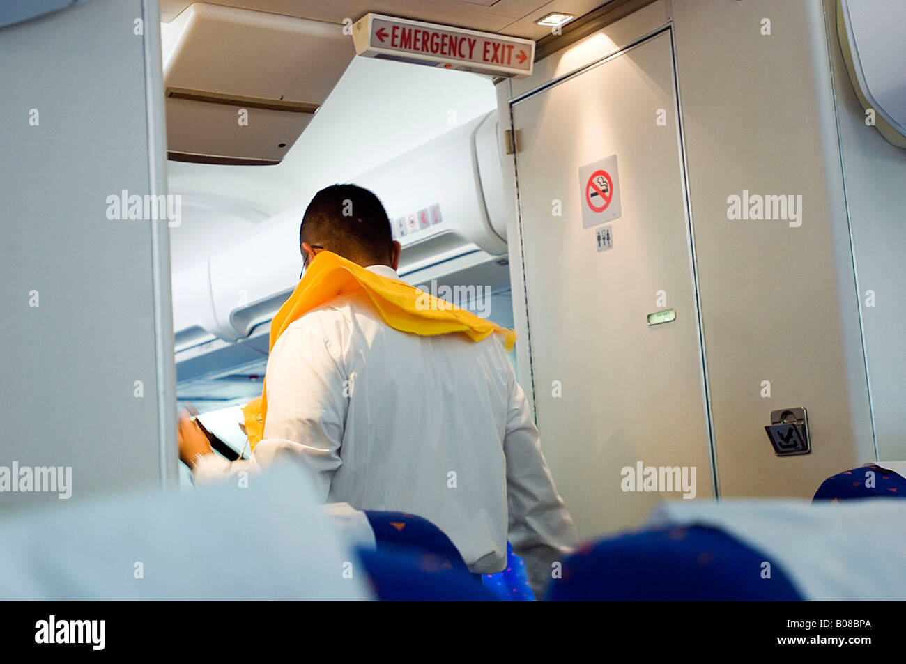 Flight attendant safety instruction hi-res stock photography and images ...