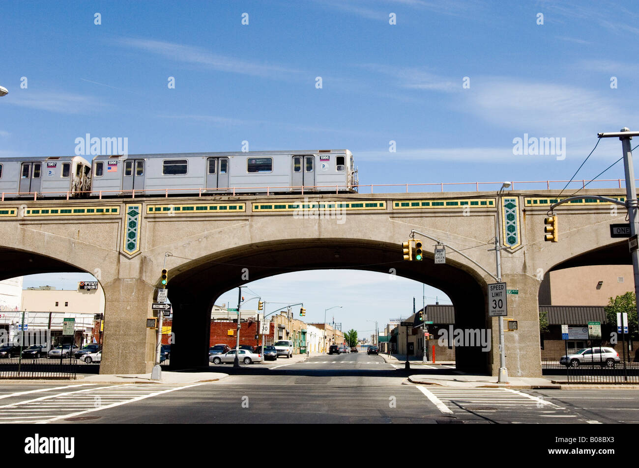 NYC train seen from below Stock Photo - Alamy