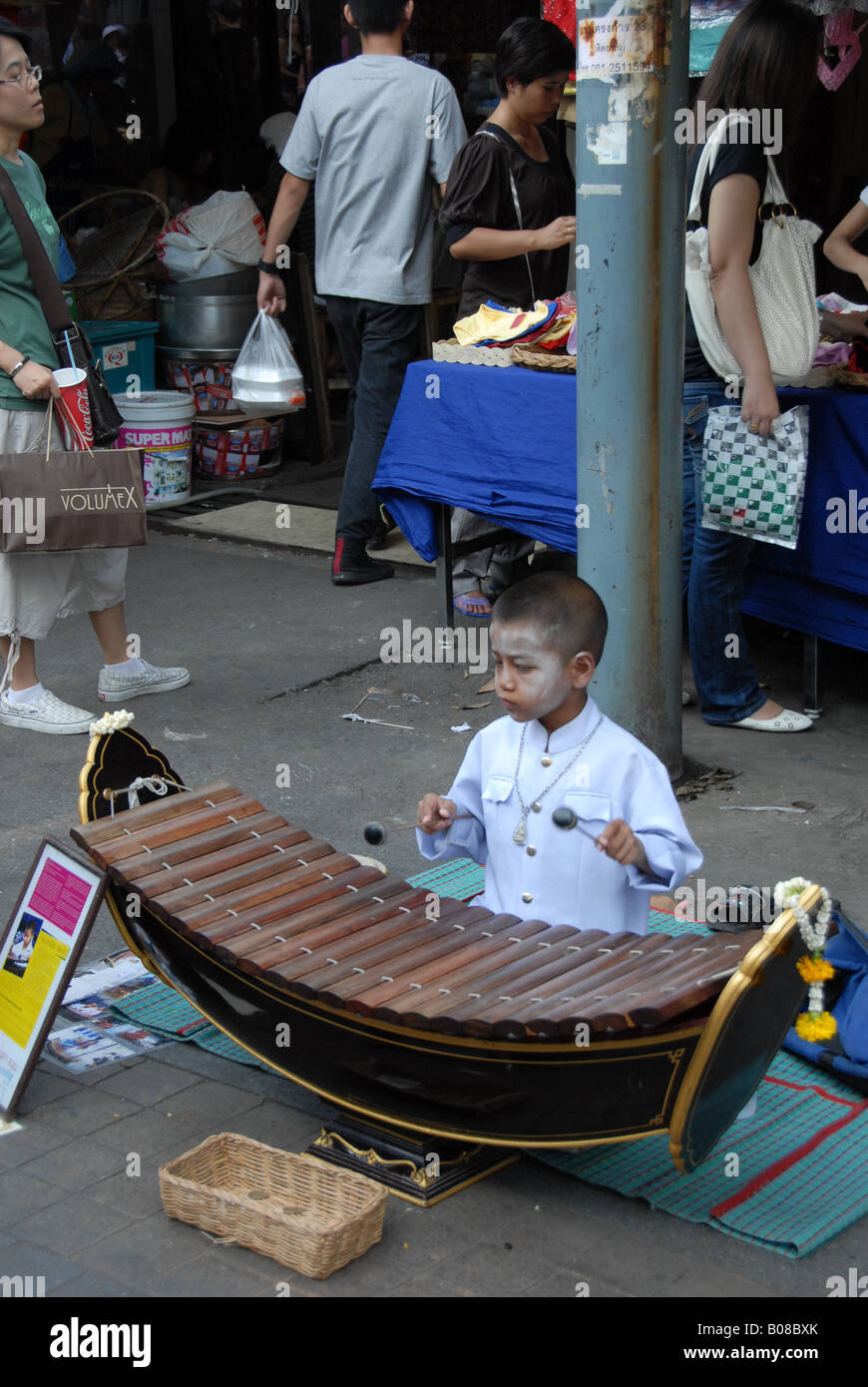 Boy playing xylophone thai music instrument hi-res stock photography ...