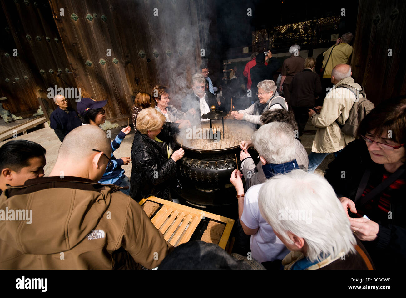 Placing incense prayer sticks at Todaiji Temple in Nara, Japan Stock ...