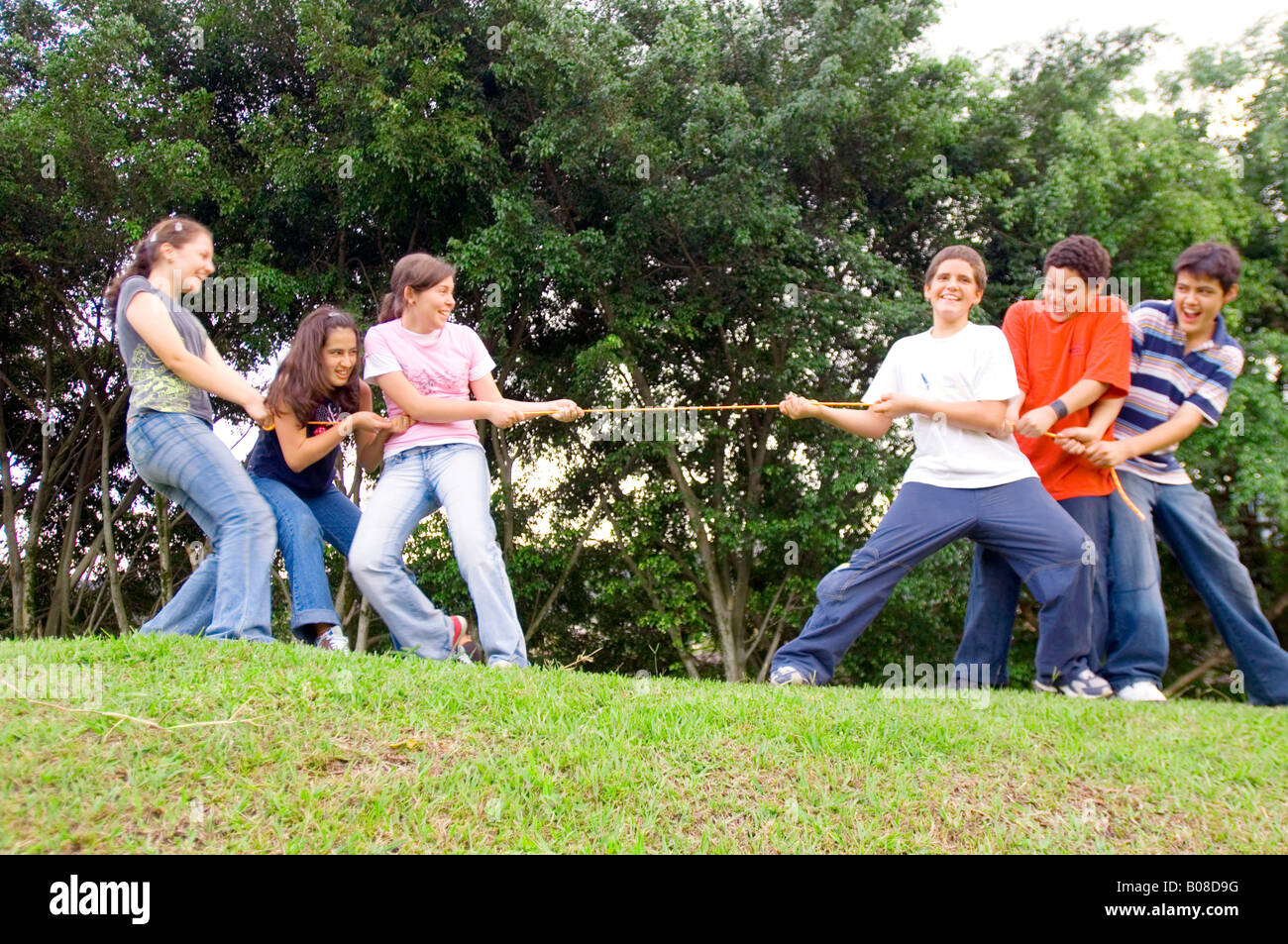 kids-playing-tug-of-war-stock-photo-alamy