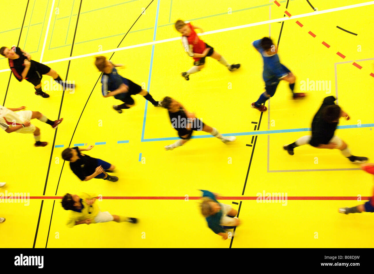 Young kids running indoors Stock Photo - Alamy