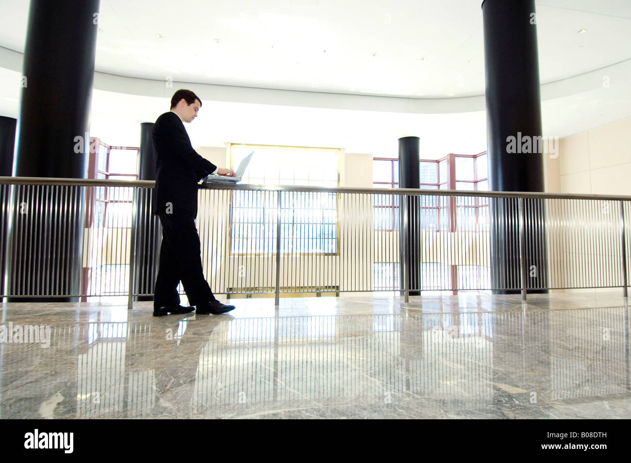 Man checking messages in laptop Stock Photo - Alamy