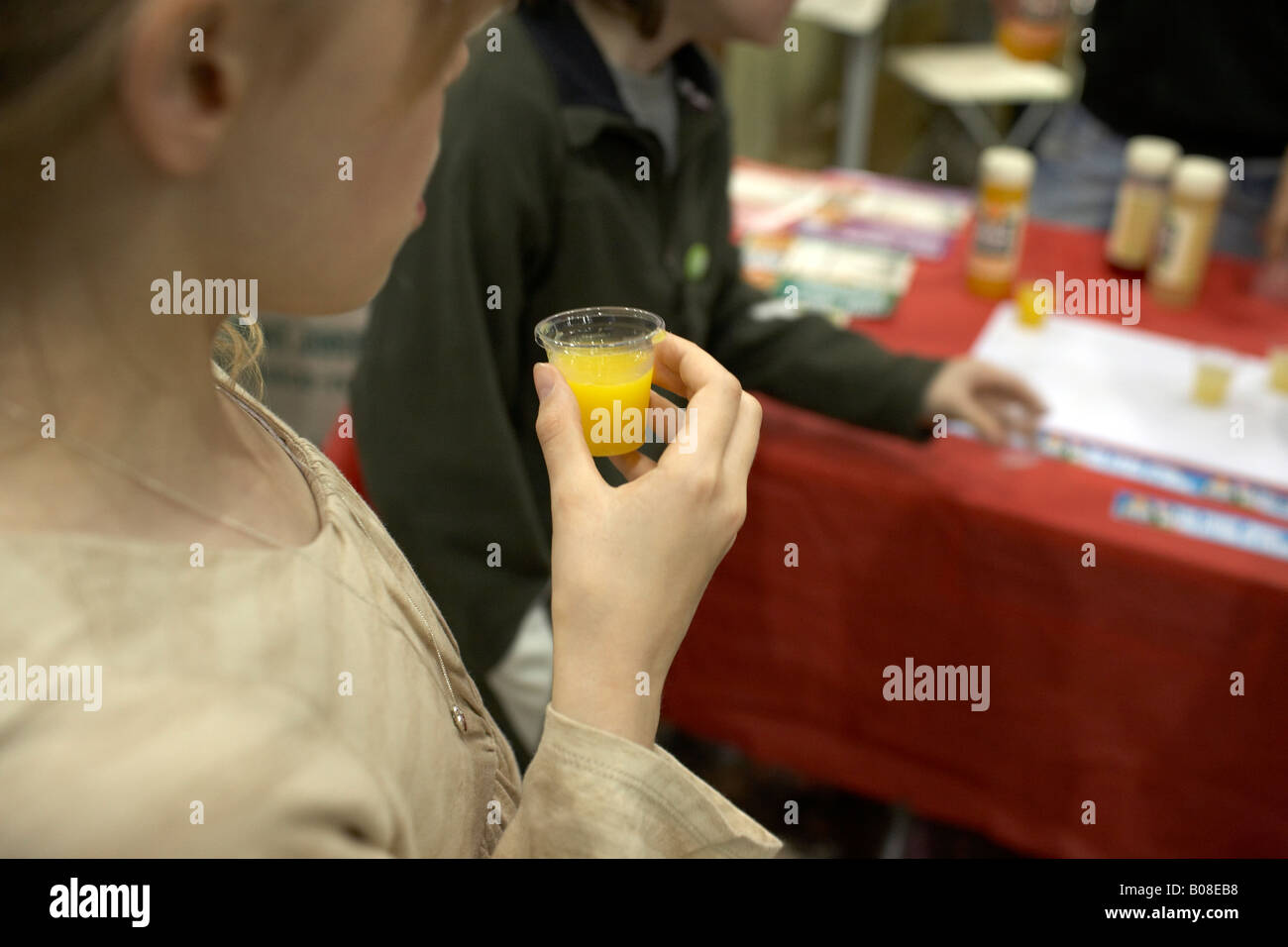 Juice tasting at food festival Stock Photo - Alamy