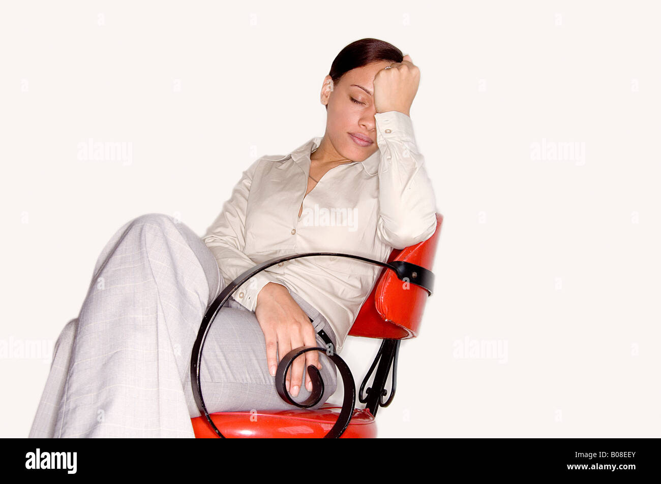 Woman relaxing on chair Stock Photo - Alamy