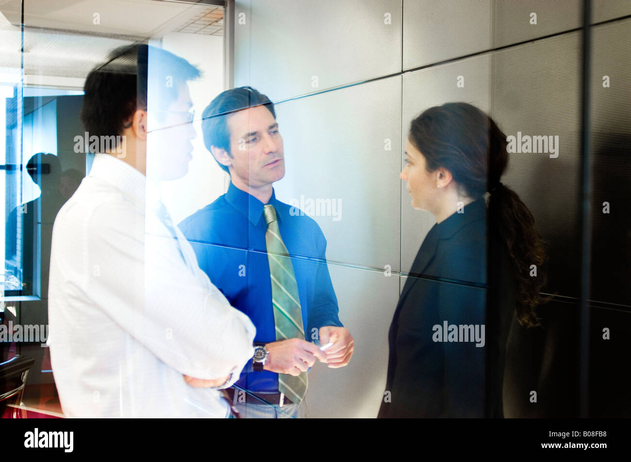 Business executives having a conversation Stock Photo - Alamy