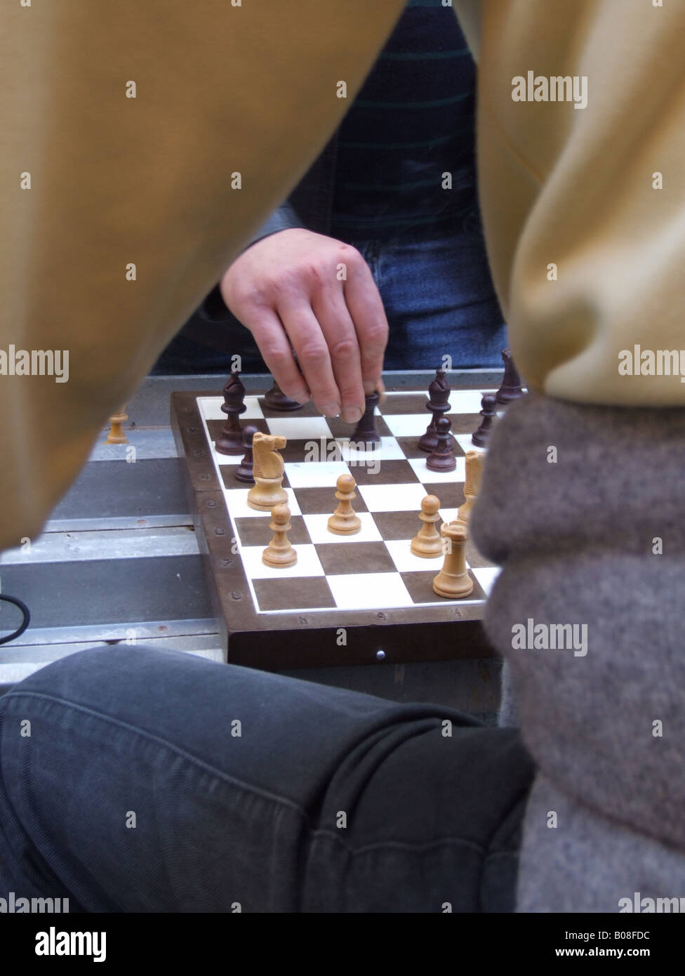 two men playing chess game outdoors Stock Photo - Alamy