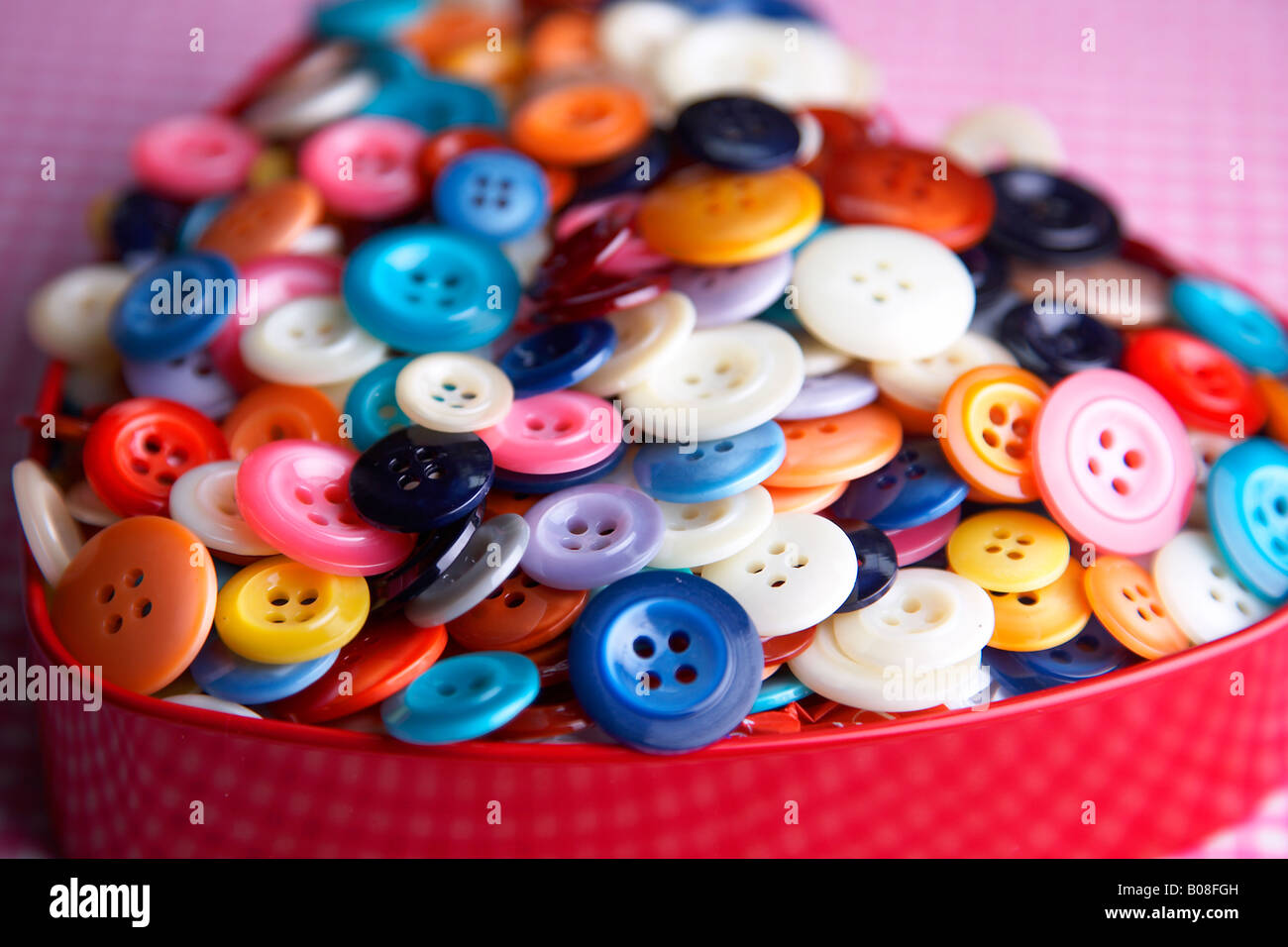 Tin of buttons Stock Photo - Alamy