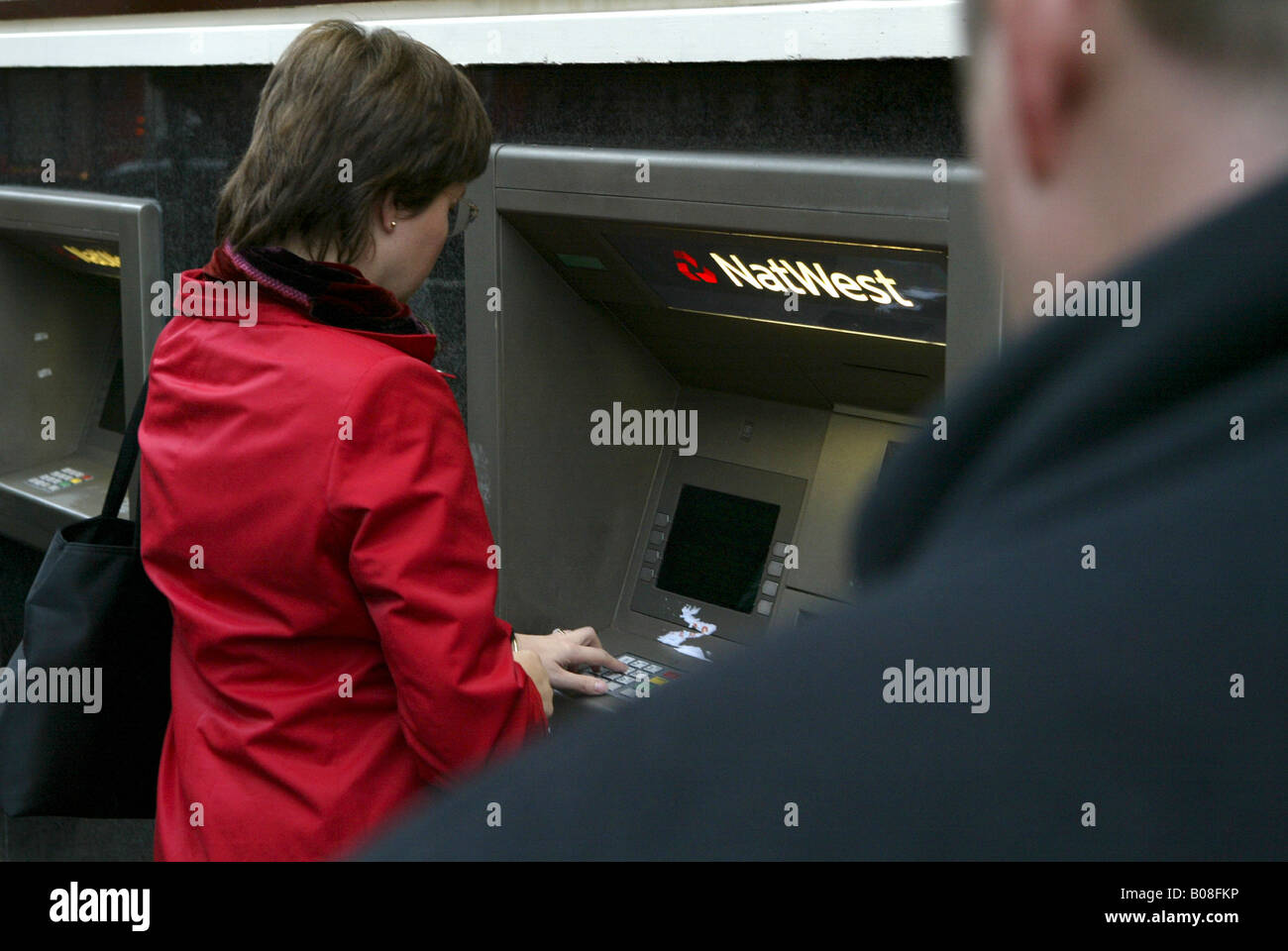Woman man street look over shoulder hi-res stock photography and images ...