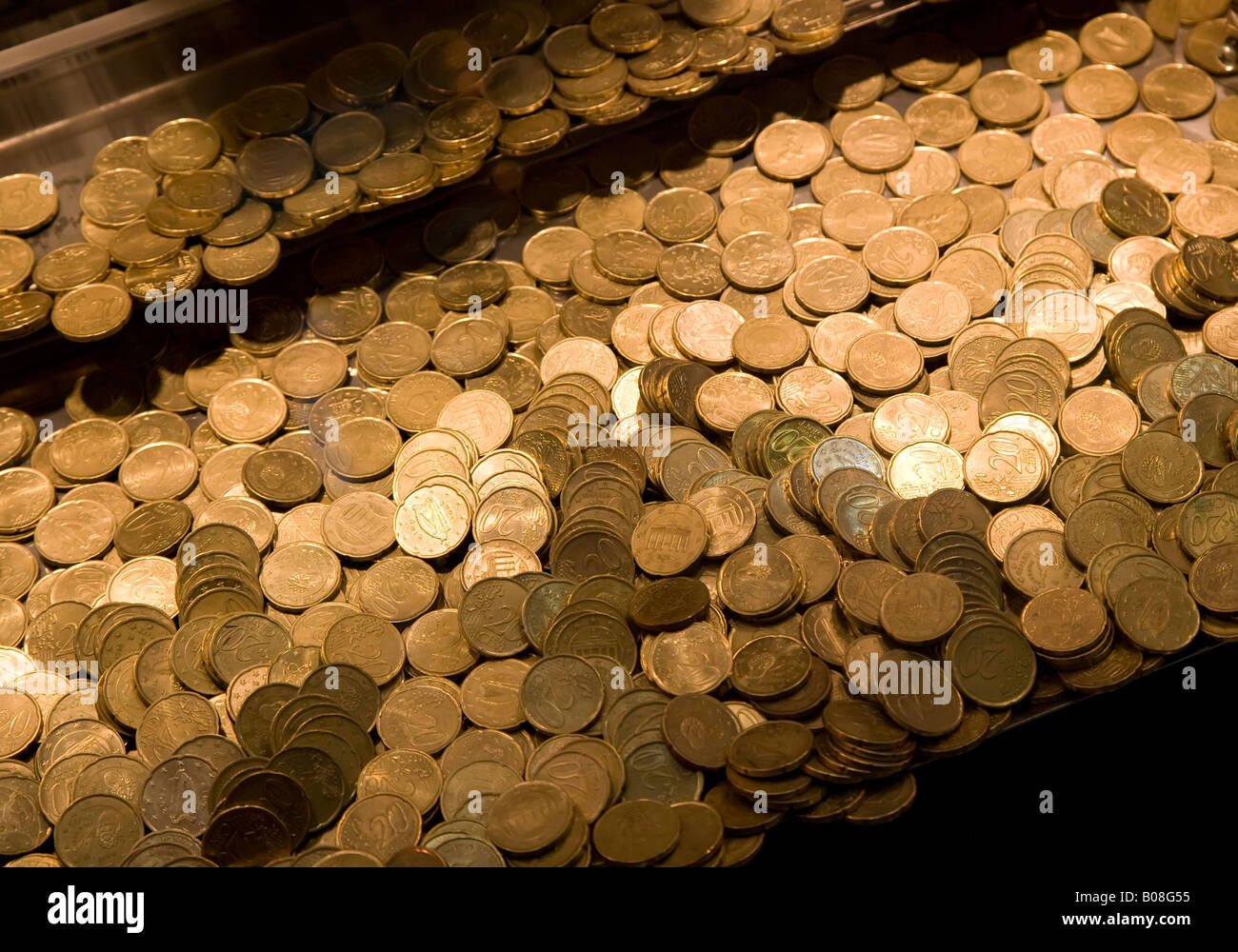 Money coins arcade game hi-res stock photography and images - Alamy