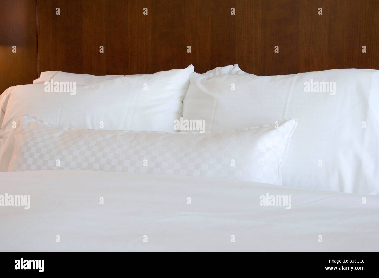 Bed with pillows Stock Photo - Alamy