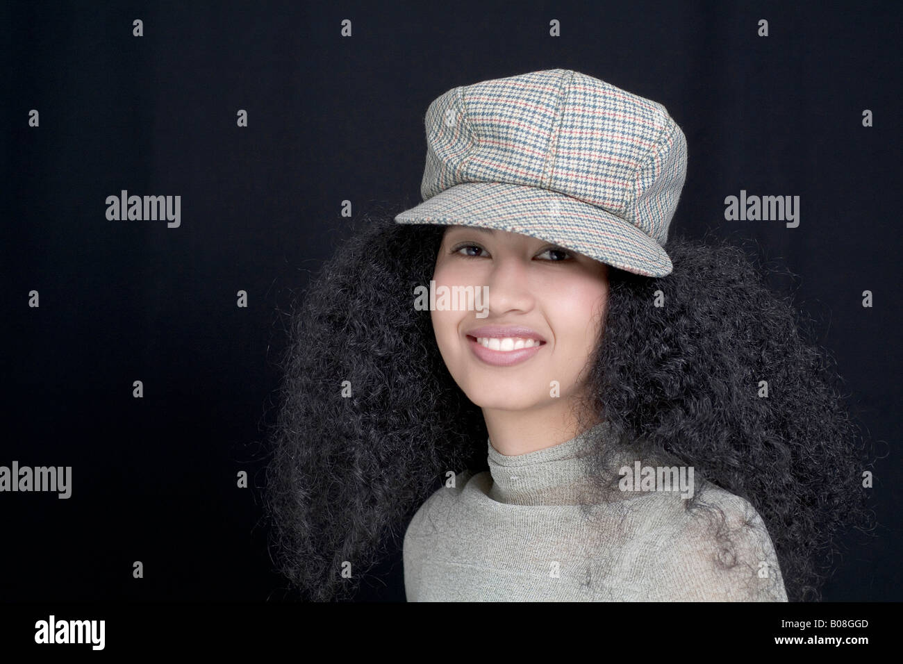 Portrait of woman with cap Stock Photo - Alamy