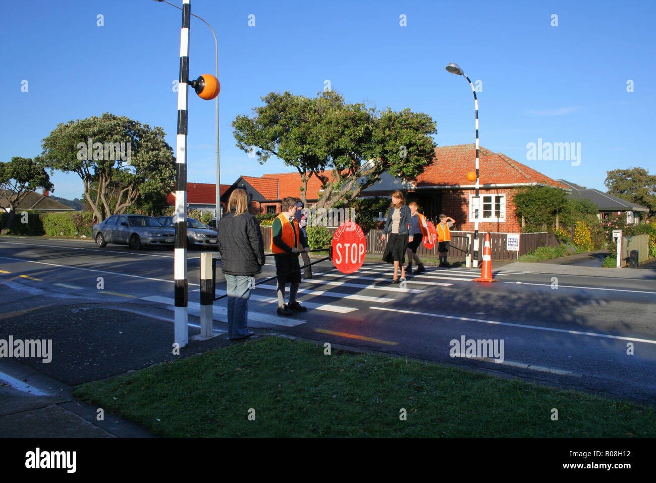 School patrol pedestrian crossing in operation Stock Photo - Alamy