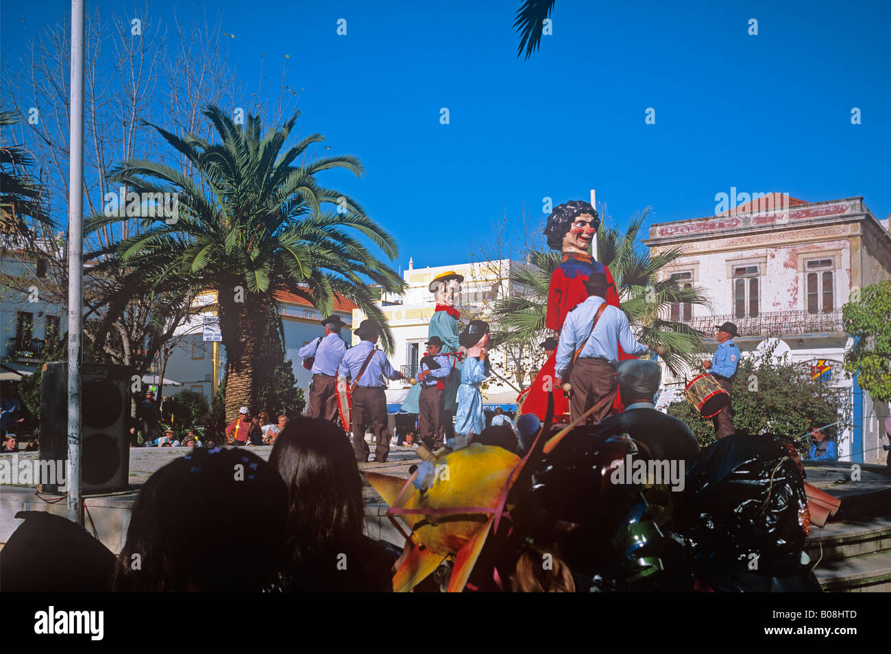 Costumed figures dancing in the central plaza of Albufeira early ...