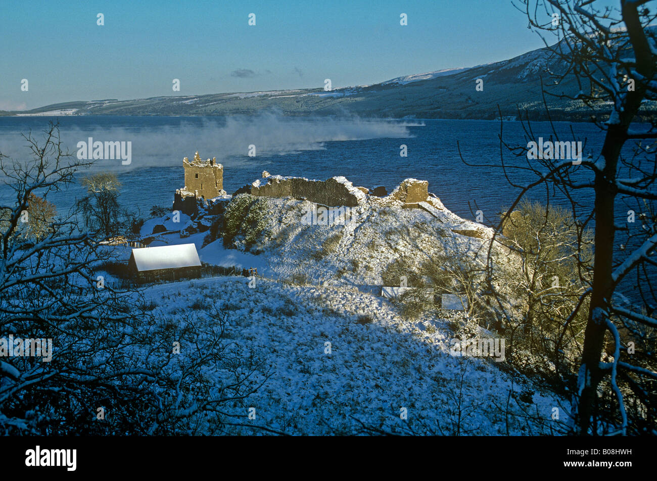 steam rising from Loch Ness off shore from Urquart Castle in winter ...