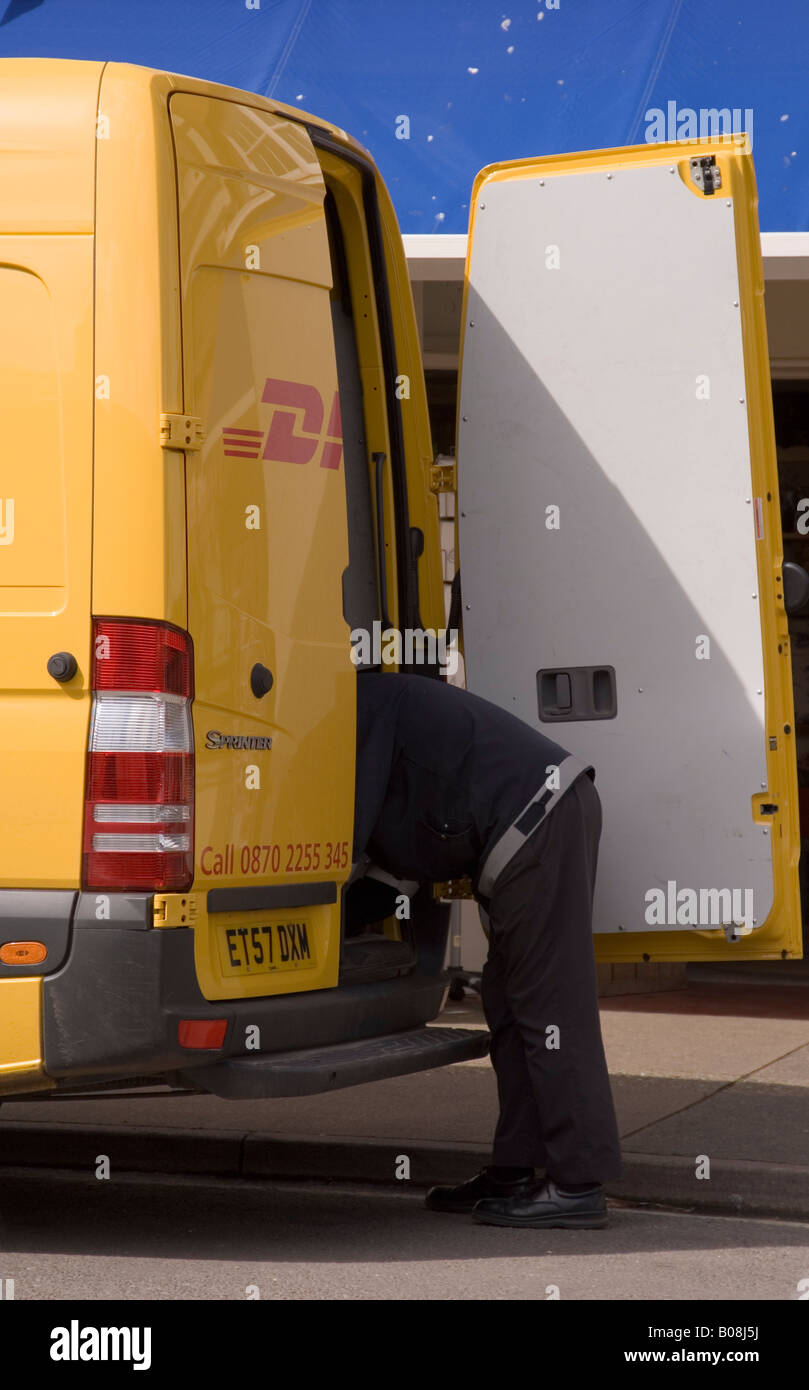 Man Unloading DHL Delivery Van Stock Photo - Alamy