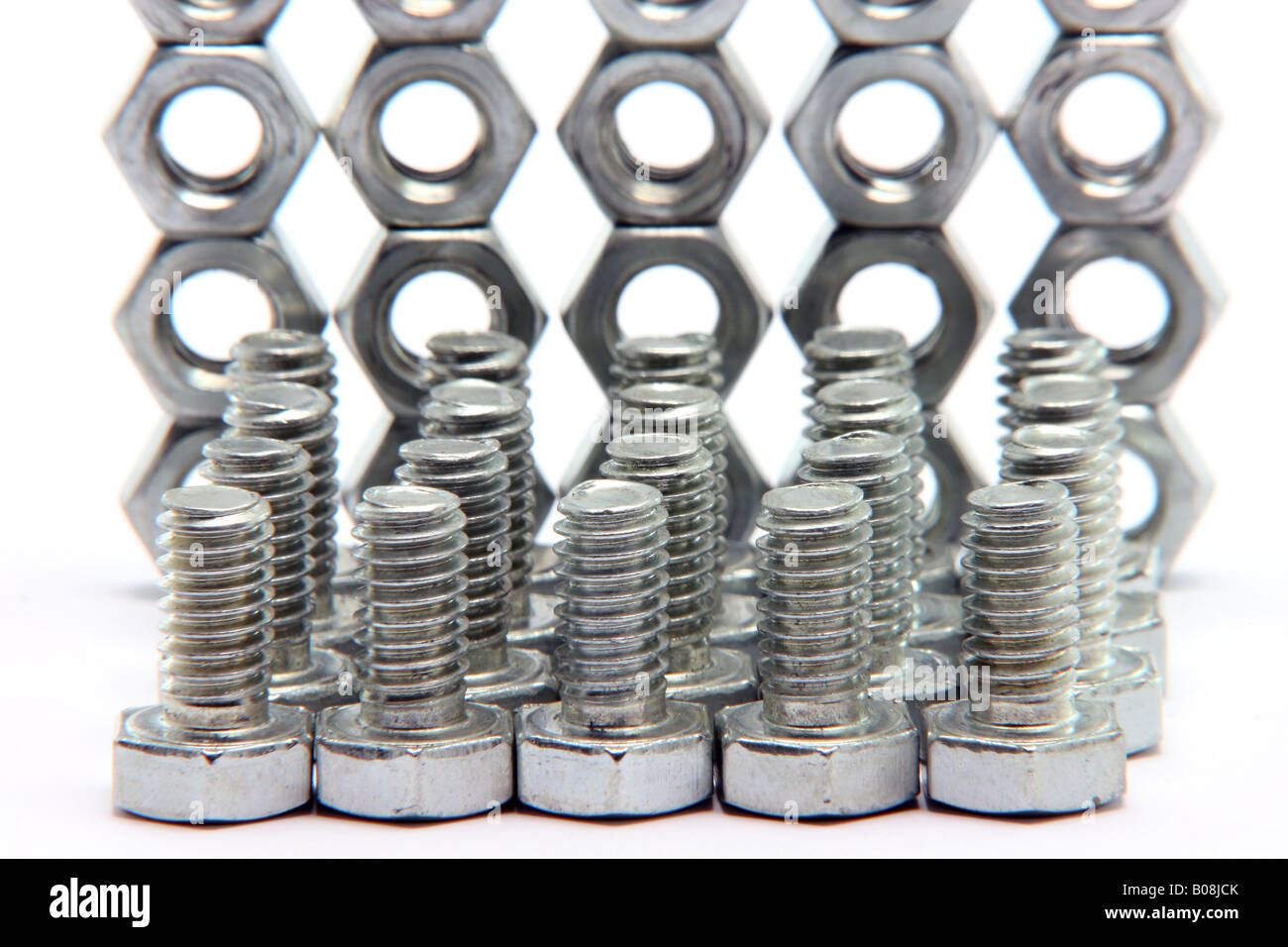 srews and bolts blur on white background construction industry Stock ...