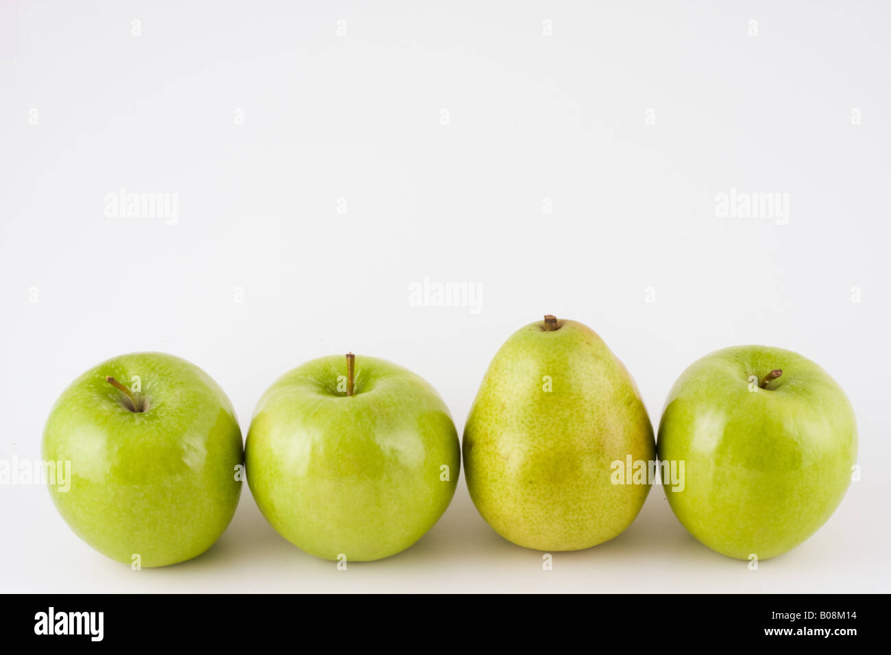 Four green apples hi-res stock photography and images - Alamy