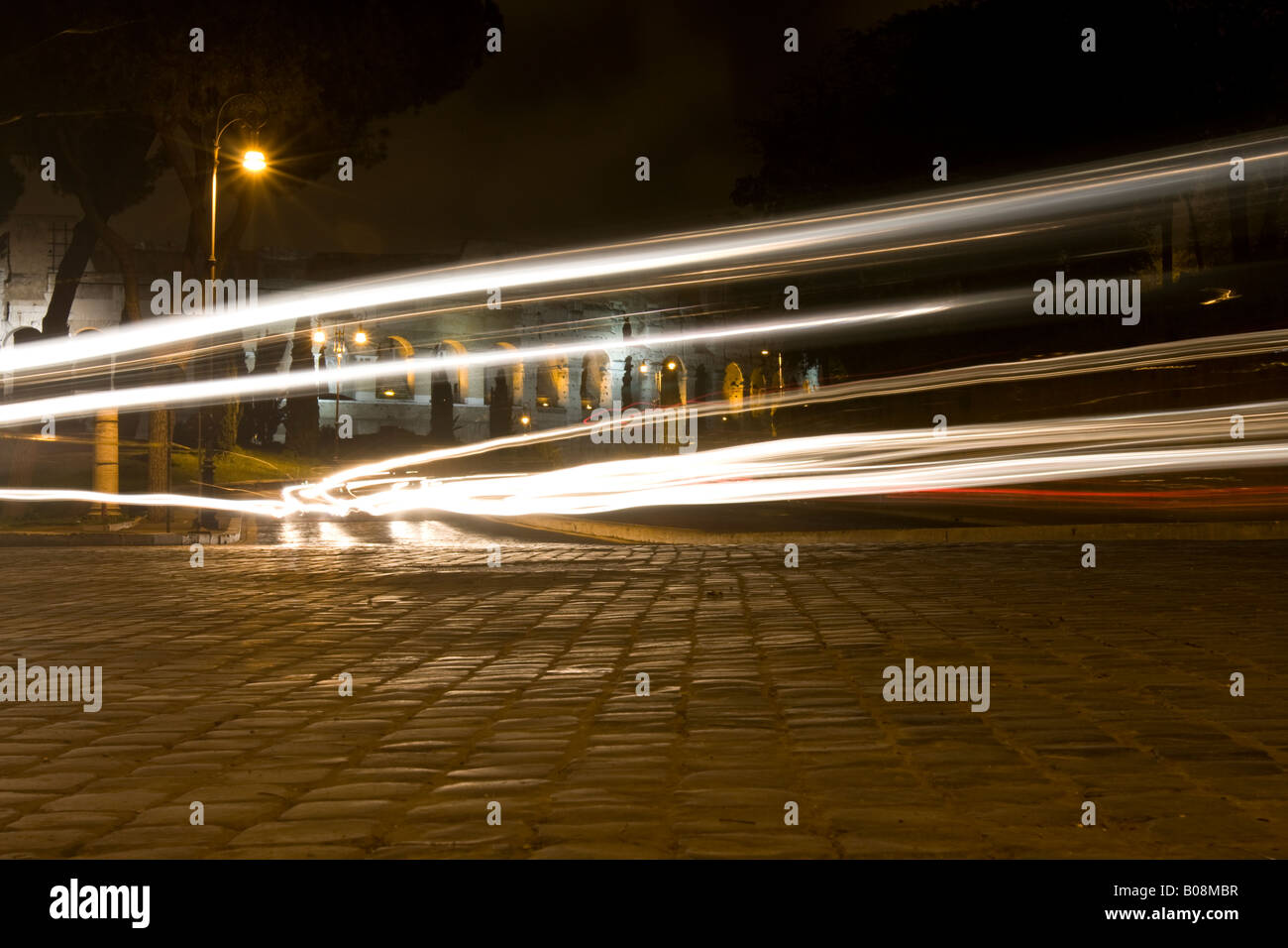 Colosseum at night Rome Italy, light trails Stock Photo - Alamy