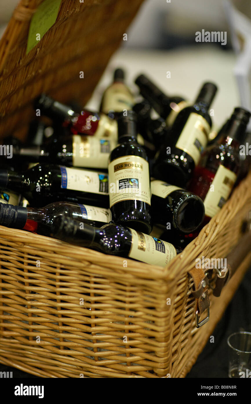 Small bottles of red wine, nestled in a basket Stock Photo - Alamy