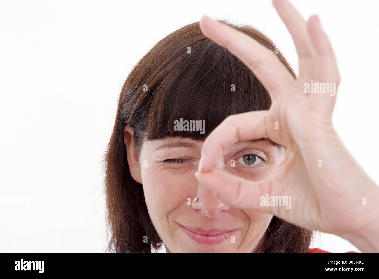 Squinting One Eye High Resolution Stock Photography and Images - Alamy
