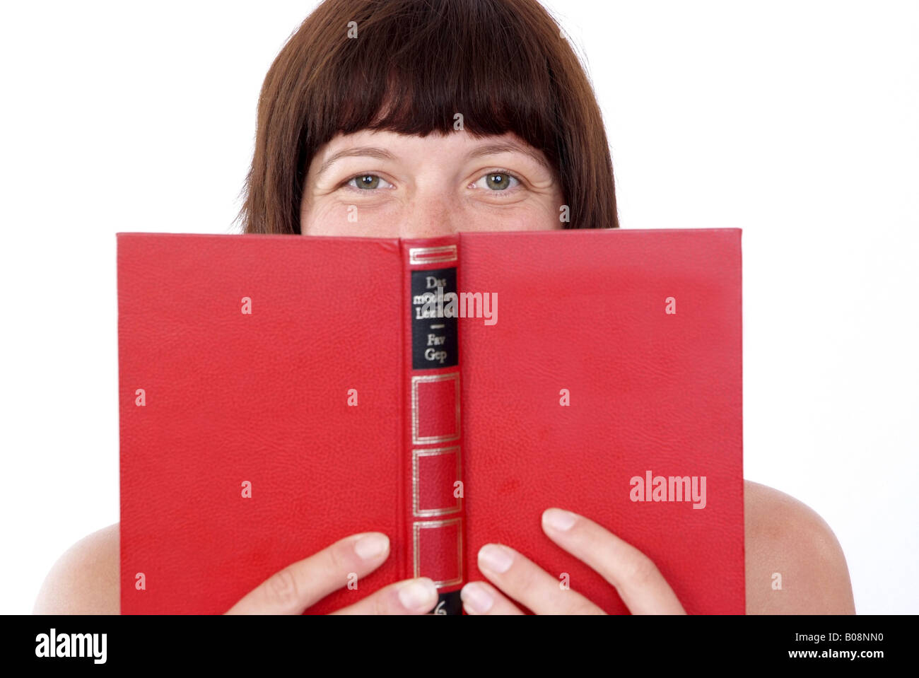 brown-haired woman reading a book Stock Photo - Alamy