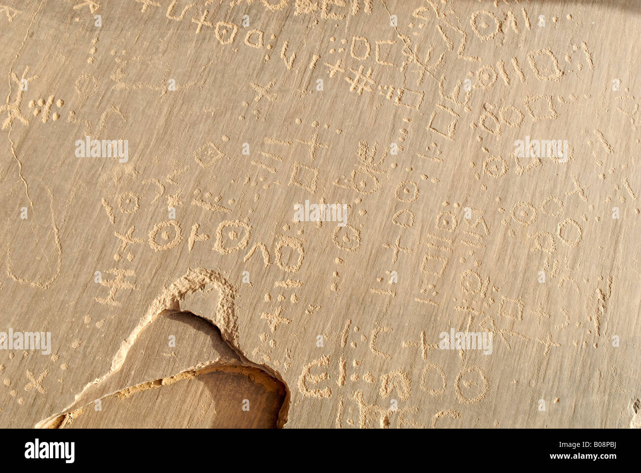 Tuareg script (Tifinagh) on stone, rock carvings, Youf Ahakit, Tassili ...