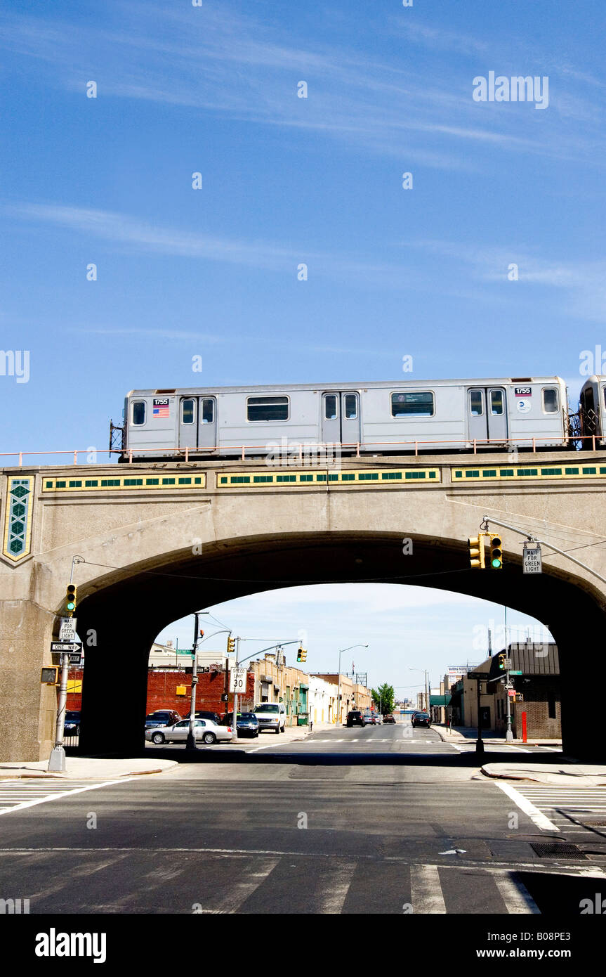 NYC train seen from below Stock Photo - Alamy