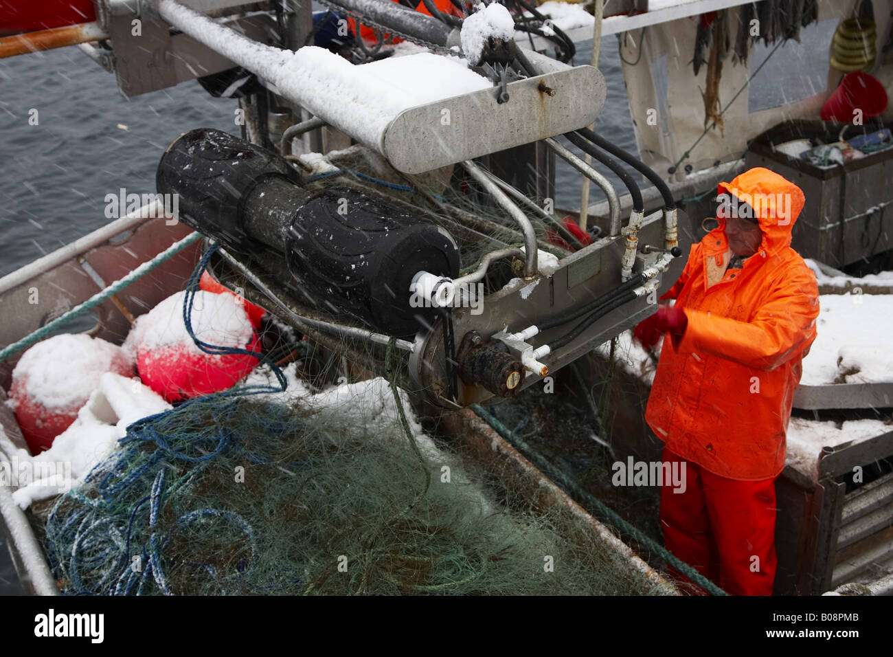 workers at the harbour, Norway, Lofoten Islands, Vagan, Henningsvaer ...