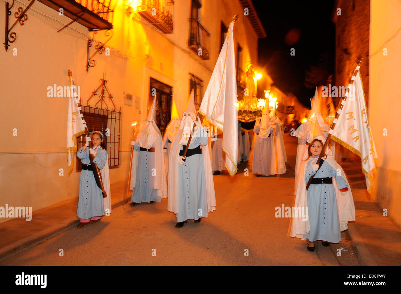 Penitents wearing penitential robes (nazareno), Holy Week procession ...